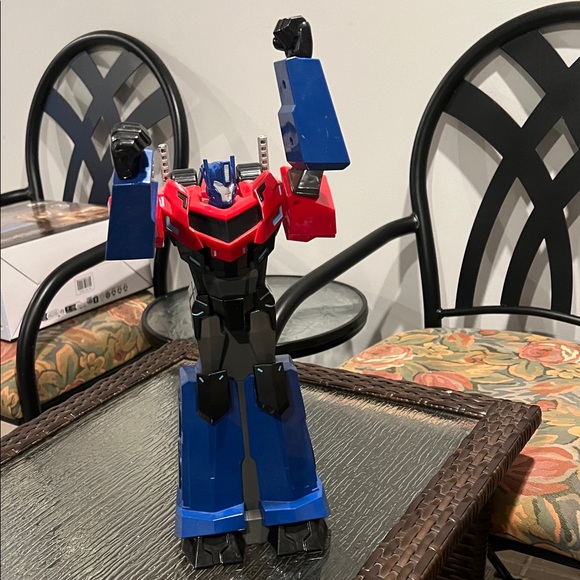 Hasbro | Toys | Transforming Robot Action Figure Red And Blue | Poshmark